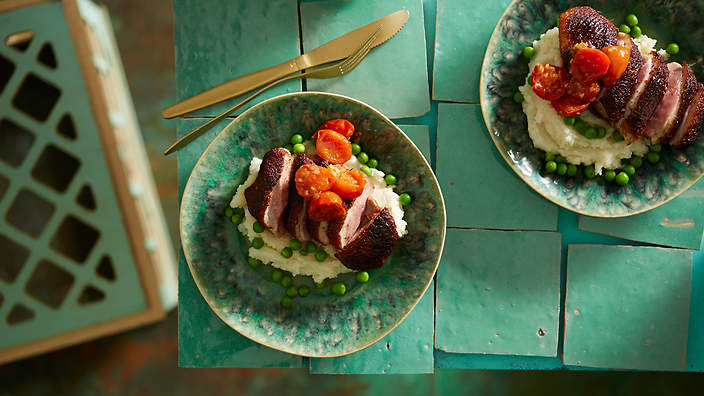 Spiced duck breast with warm cherry tomato vinaigrette